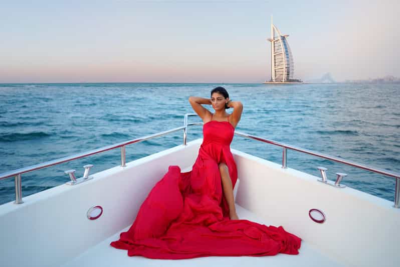 Private Dubai Marina Yacht Flying Dress Photo Shooting | GetYourGuide