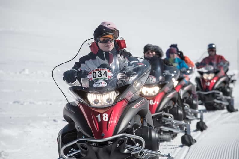 Snowmobile Tour Madesimo / Splügen Pass (Daytrip St. Moritz) | GetYourGuide