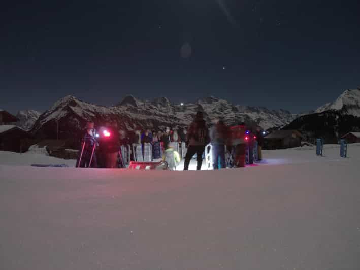 From Interlaken: Night Sledding with Cheese Fondue Dinner | GetYourGuide
