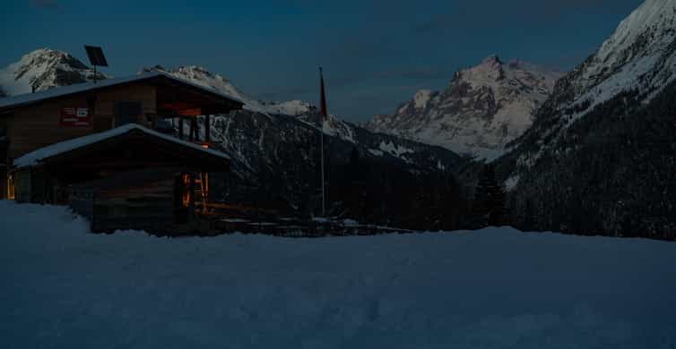 From Interlaken: Night Sledding with Cheese Fondue Dinner | GetYourGuide