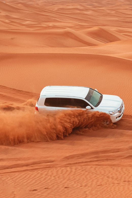 Doha: Sunrise Desert Safari with Dune Bashing and Inland Sea | GetYourGuide