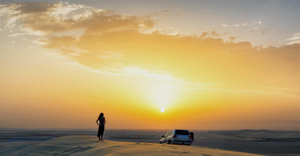 Doha: Desert Tour, Camels, Sand Surfing & Falcon Experience | GetYourGuide