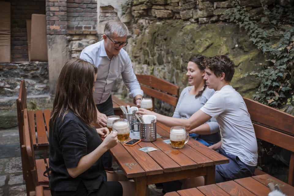 Prague: Local Pub Walking Tour with 5 Beers and Snacks | GetYourGuide