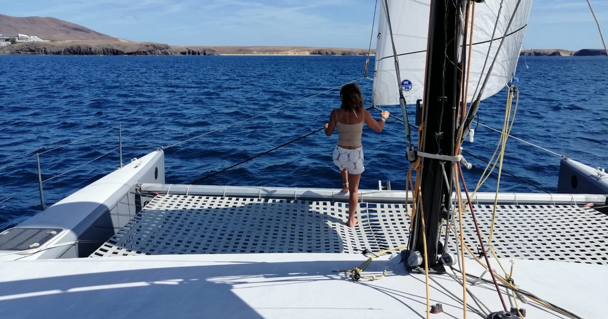 Playa Blanca: Private Katamaran-Tour mit SUP und Schnorcheln | GetYourGuide