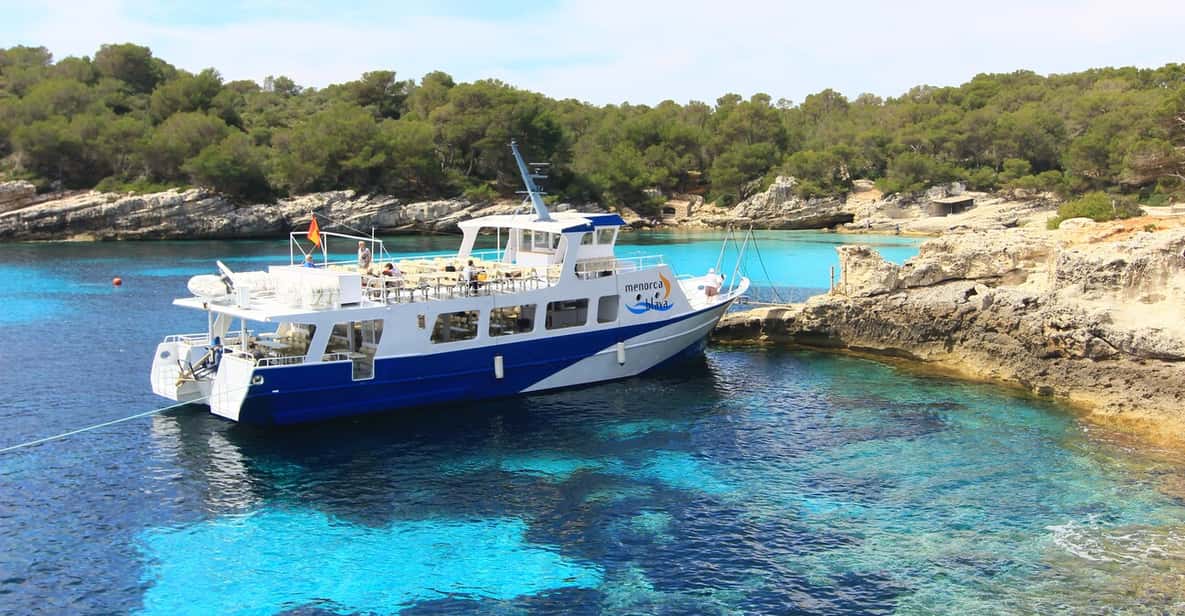 Menorca: Boat Tour of South Coast w/ Beach Stop & transfer | GetYourGuide