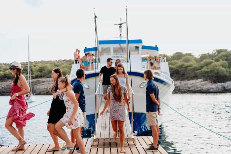 Menorca: Boat Tour of South Coast w/ Beach Stop & transfer | GetYourGuide