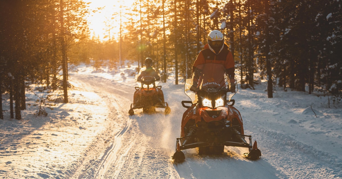 Ylläs: Snowmobile Tour to Arctic Snow Village & Snack | GetYourGuide