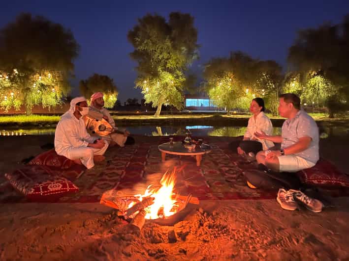 Dubai: Evening Camel Safari & Bedouin Dinner at Al Marmoom | GetYourGuide