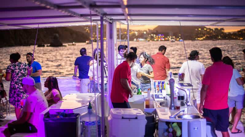 Cabo San Lucas: Sunset Party Cruise with Open Bar | GetYourGuide