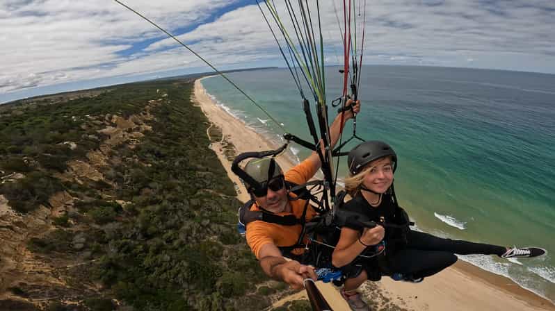 From Lisbon: Paragliding Pack (Flight+Video+Transportation) | GetYourGuide