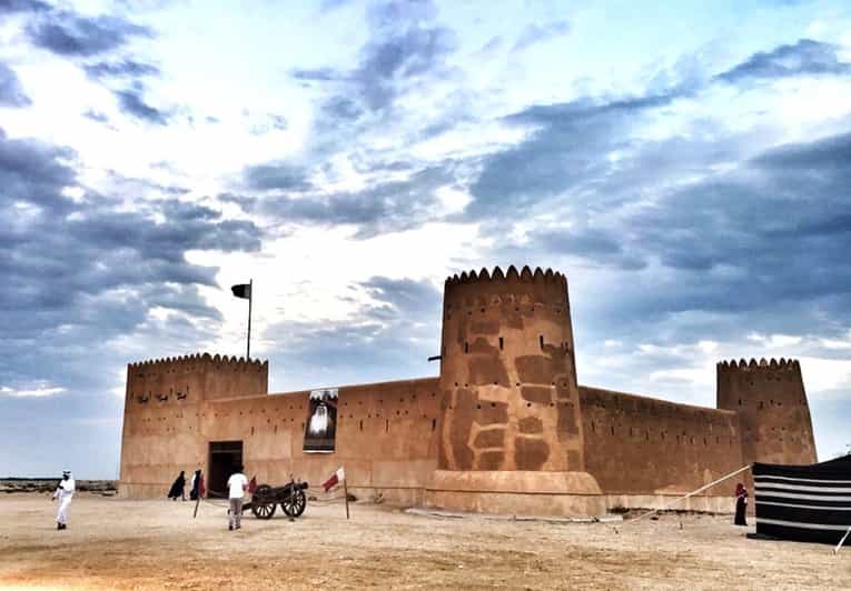 From Doha: Al Ruwais, Aljumail Abandoned Village Guided Tour | GetYourGuide