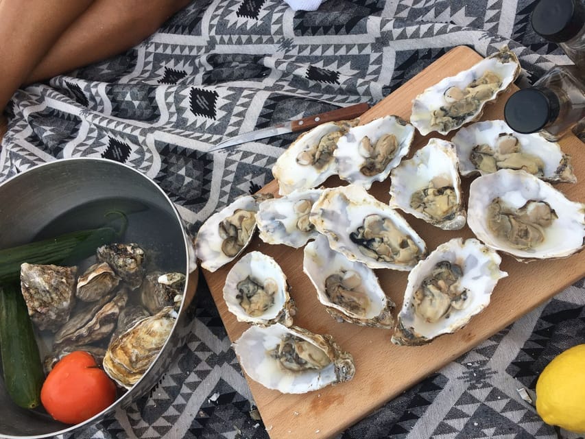 Mykonos: Visita guiada y picnic en la playa con marisco | GetYourGuide