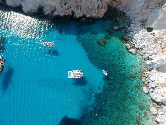 Milos: Milos and Polyaigos Snorkeling and SUP Cruise | GetYourGuide