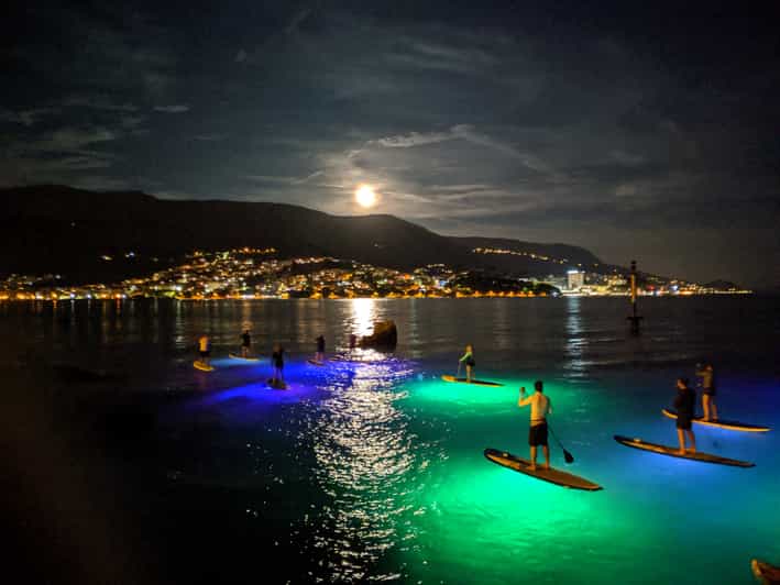Split: Stand Up Paddleboard Night Glow Tour | GetYourGuide
