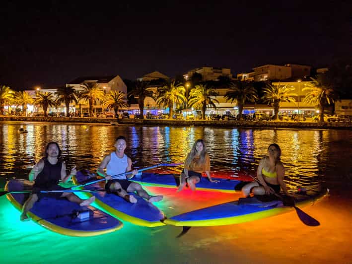 Split: Stand Up Paddleboard Night Glow Tour | GetYourGuide