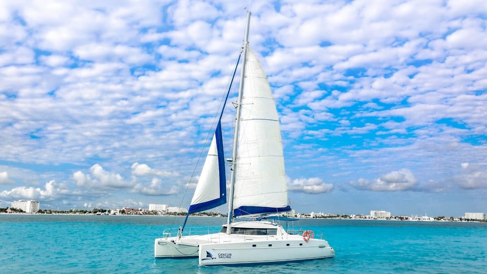 Cancún: Catamaran Party to Isla Mujeres with Buffet and Bar | GetYourGuide