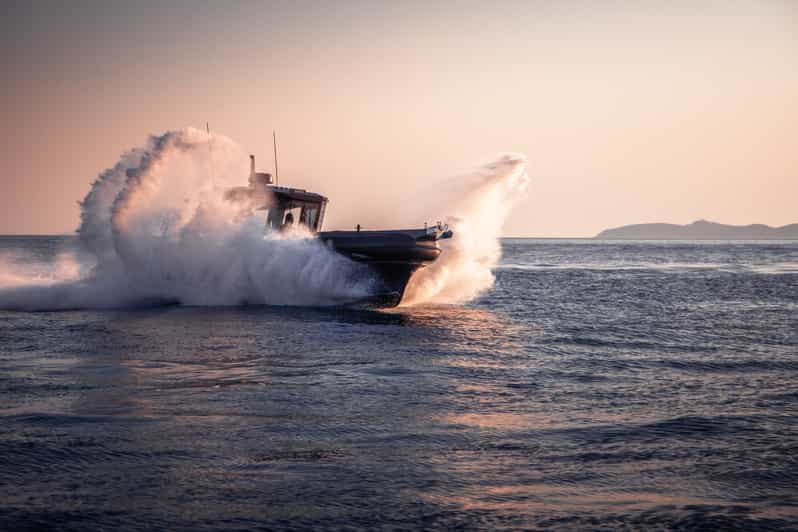 Mykonos Private full day cruise with a Rafnar 1200 T-Top | GetYourGuide