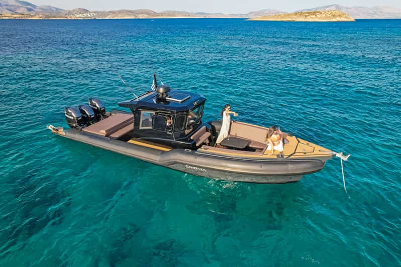 Mykonos Private full day cruise with a Rafnar 1200 T-Top | GetYourGuide