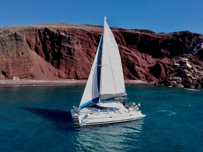 Santorini: Full Day Catamaran Excursion with Food & Drinks | GetYourGuide