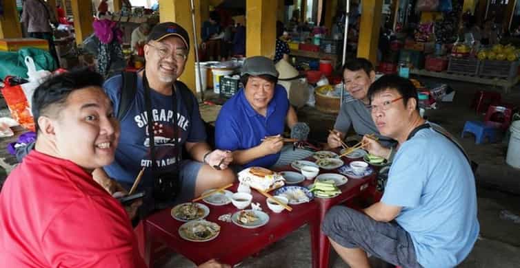 Hue: Night Street Food Tour by Cyclo with a Local Guide | GetYourGuide