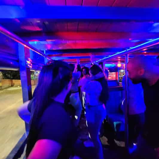 Medellin: Party Bus with DJ & Street Food Tastings | GetYourGuide