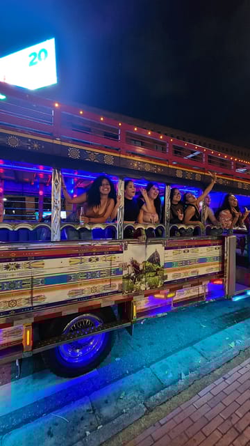Medellin: Party Bus with DJ & Street Food Tastings | GetYourGuide