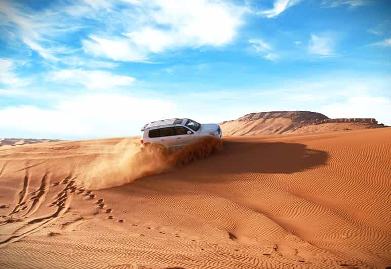 From Doha: Full-Day Desert Safari, Camel Ride & Dune Bashing | GetYourGuide