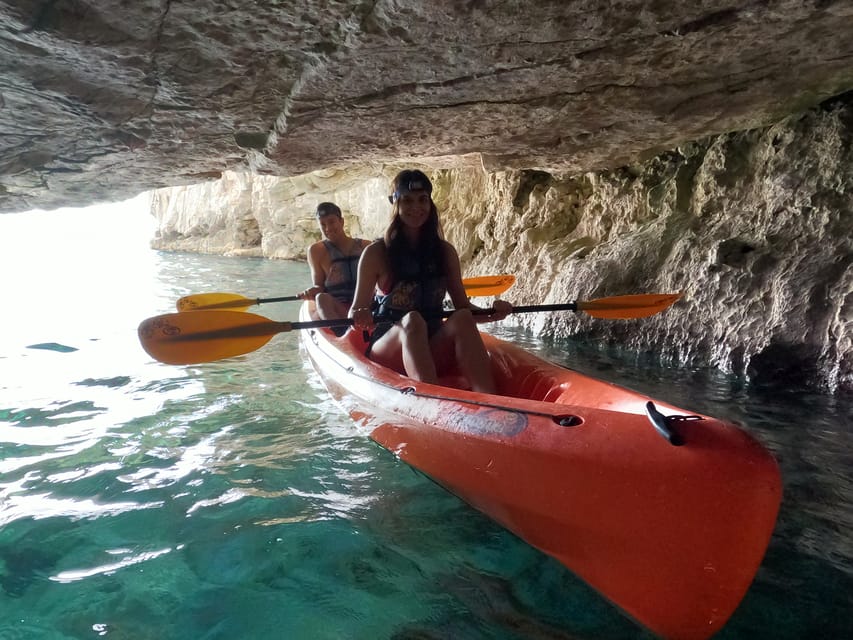 Pula: Sea Cave and Cliffs Guided Kayak Tour in Pula | GetYourGuide
