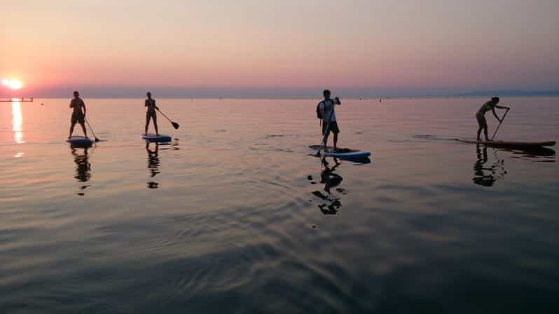 Portorož: Sunset Coastline Stand-Up Paddleboarding Tour | GetYourGuide
