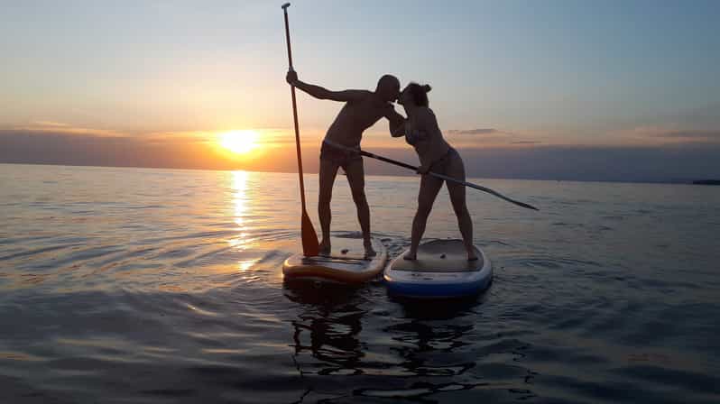 Portorož: Sunset Coastline Stand-Up Paddleboarding Tour | GetYourGuide