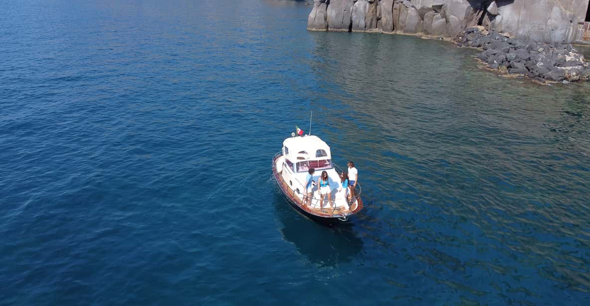 Capri: Blue Grotto and the Faraglioni Rocks Boat Tour | GetYourGuide
