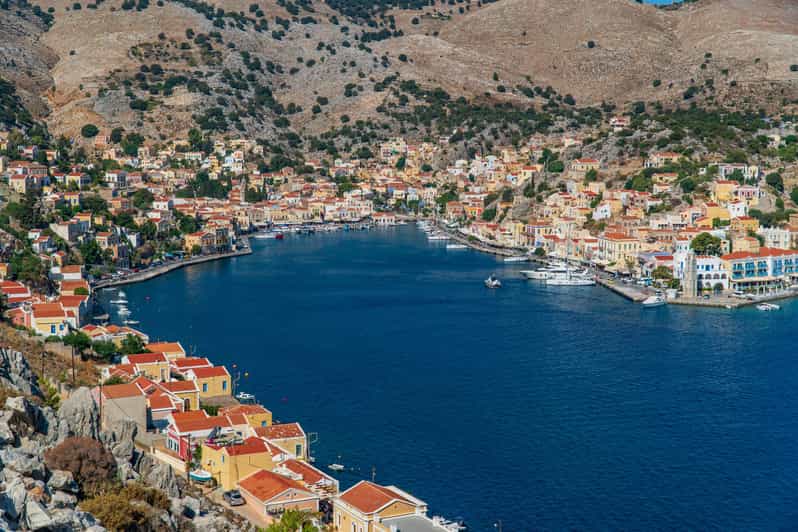 Rhodes Town: Round-trip Ferry to Symi & St. George Bay Visit | GetYourGuide