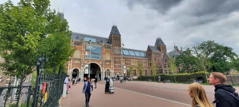 Amsterdam: Guided City & Rijksmuseum Tour and Canal Cruise | GetYourGuide