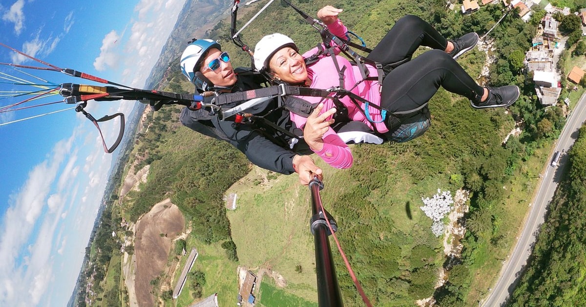 From Medellín: Paragliding Tour with GoPro Photos & Videos | GetYourGuide