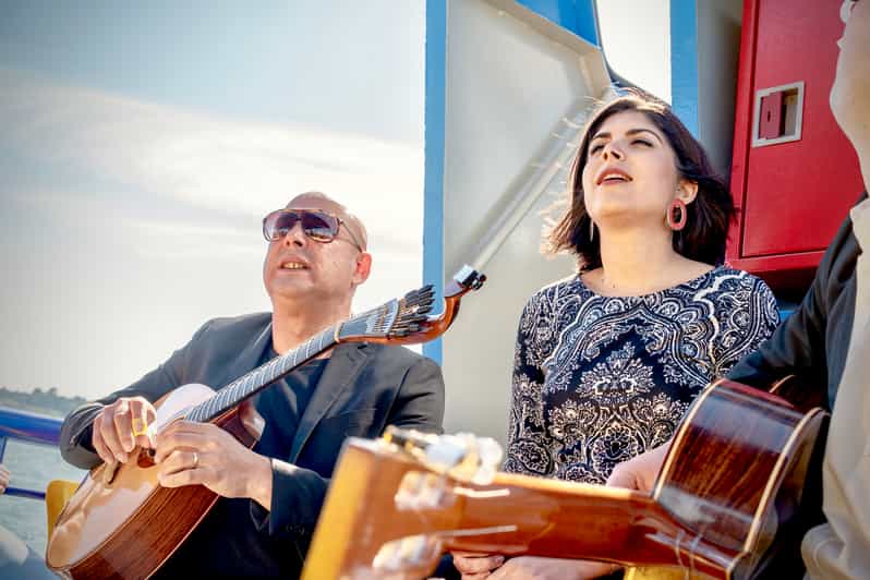 Lisbon: Boat Cruise with Live Fado Performance and a Drink | GetYourGuide