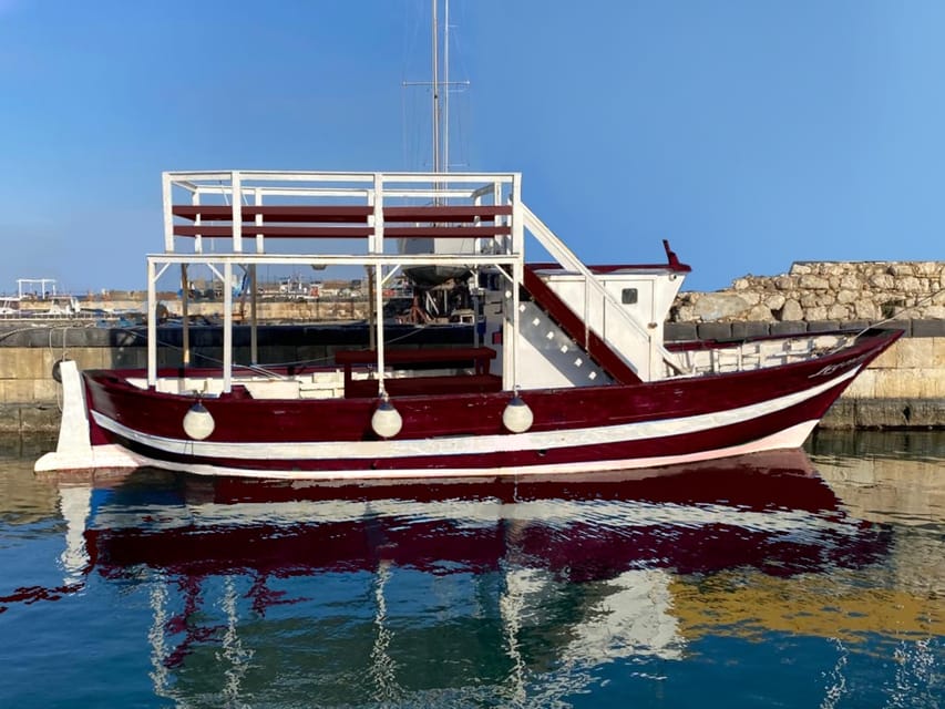 Island of Ortigia: Sunset Boat Tour with Aperitif | GetYourGuide