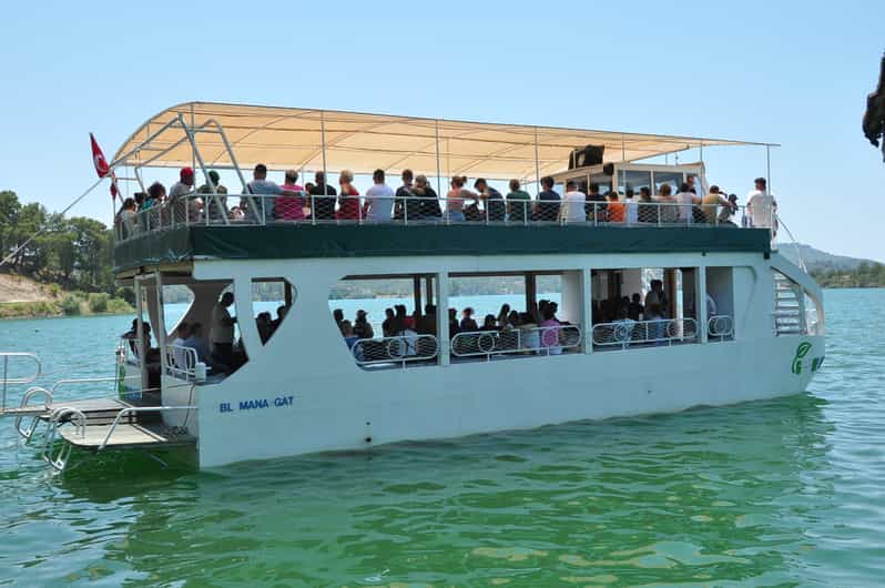 From Side: Cabrio Bus Safari and Boat Tour with Lunch | GetYourGuide