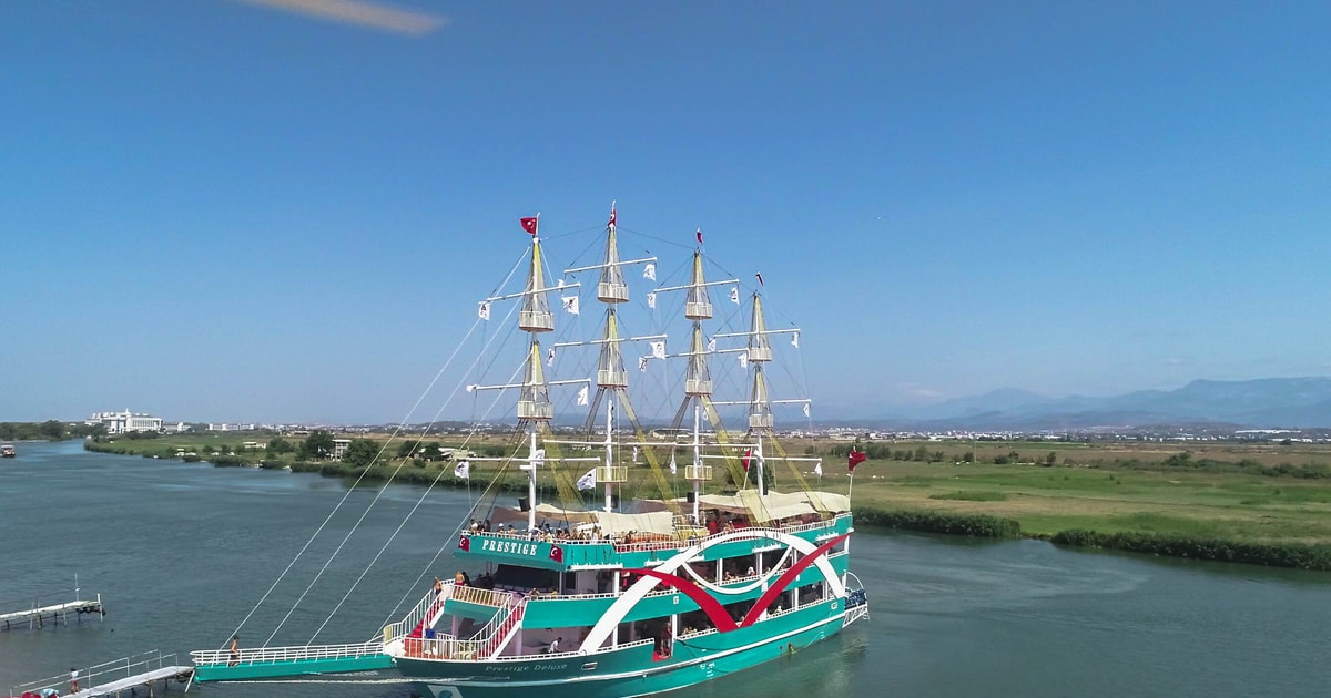 From Side: Full-Day Dolphins Island Boat Trip with Transfer | GetYourGuide