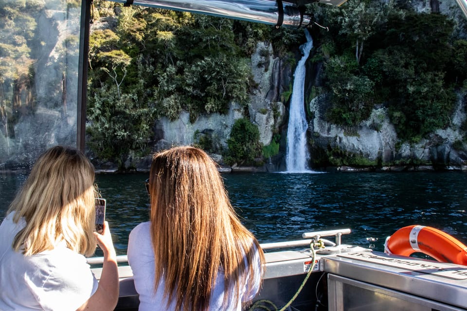 Kinloch: Lake Taupo Catamaran Cruise with Paddleboarding | GetYourGuide