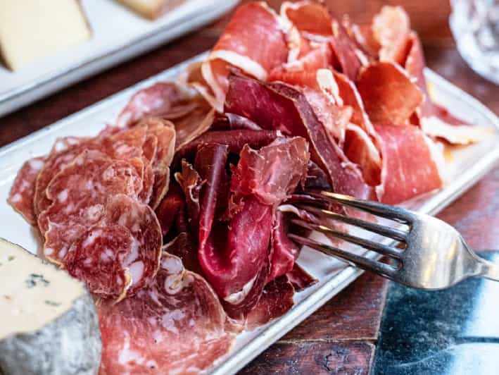 Paris: Gourmet Food Tour & Louvre Museums Guided Tour | GetYourGuide