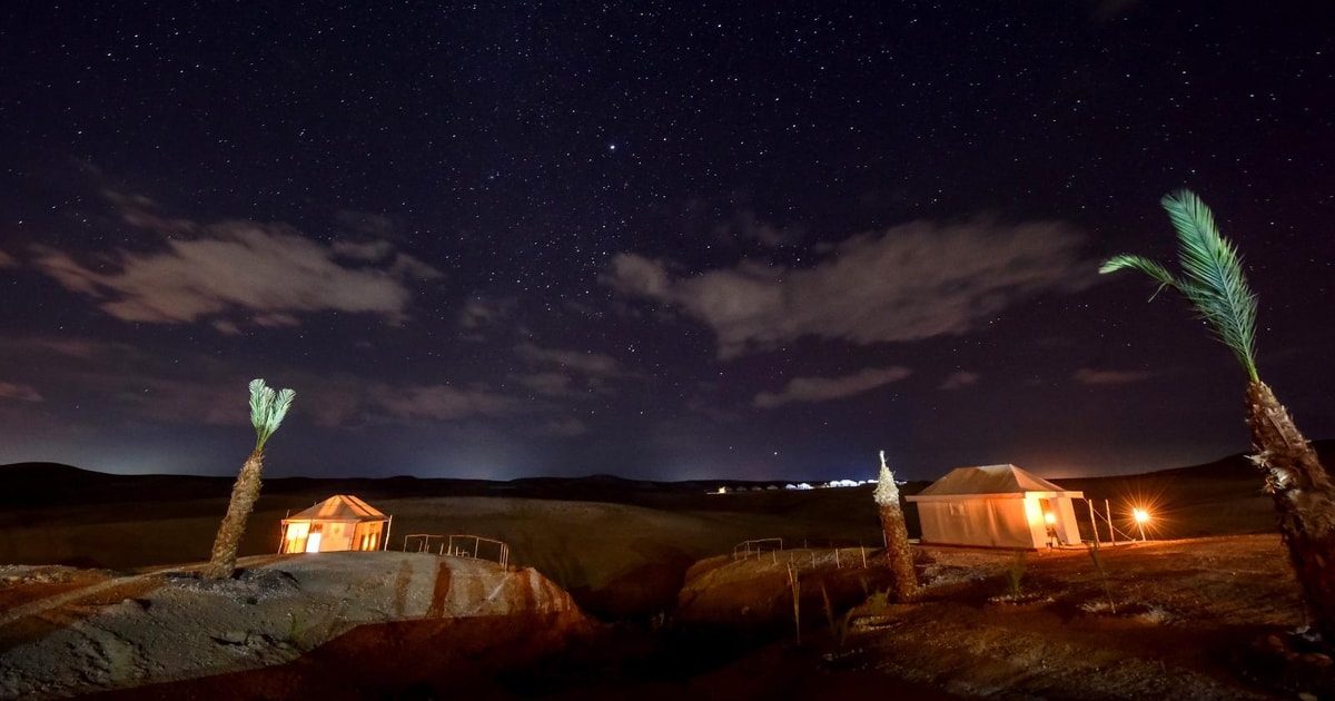 From Marrakech: Agafay Desert Sunset Dinner with Live Music | GetYourGuide