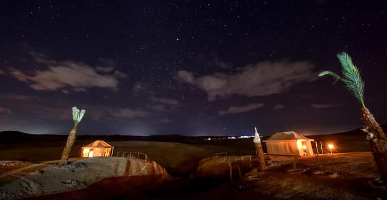 From Marrakech: Agafay Desert Sunset Dinner with Live Music | GetYourGuide