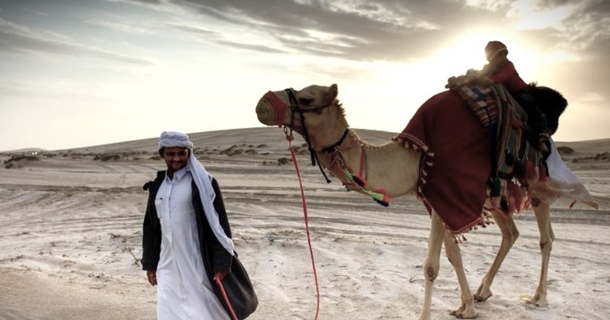 Doha Desert Safari: Sandboarding, Camel Ride & Swimming Fun | GetYourGuide