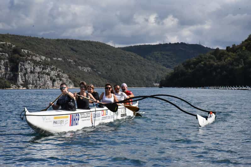 Rovinj: Lim Bay Outrigger Canoe Tour with Pirate Cave Visit | GetYourGuide