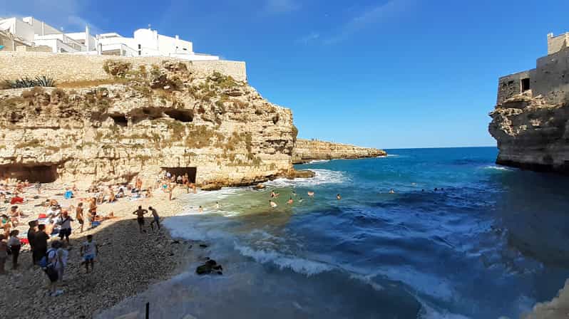 Polignano a Mare: Private Speedboat Cave Trip with Aperitif | GetYourGuide