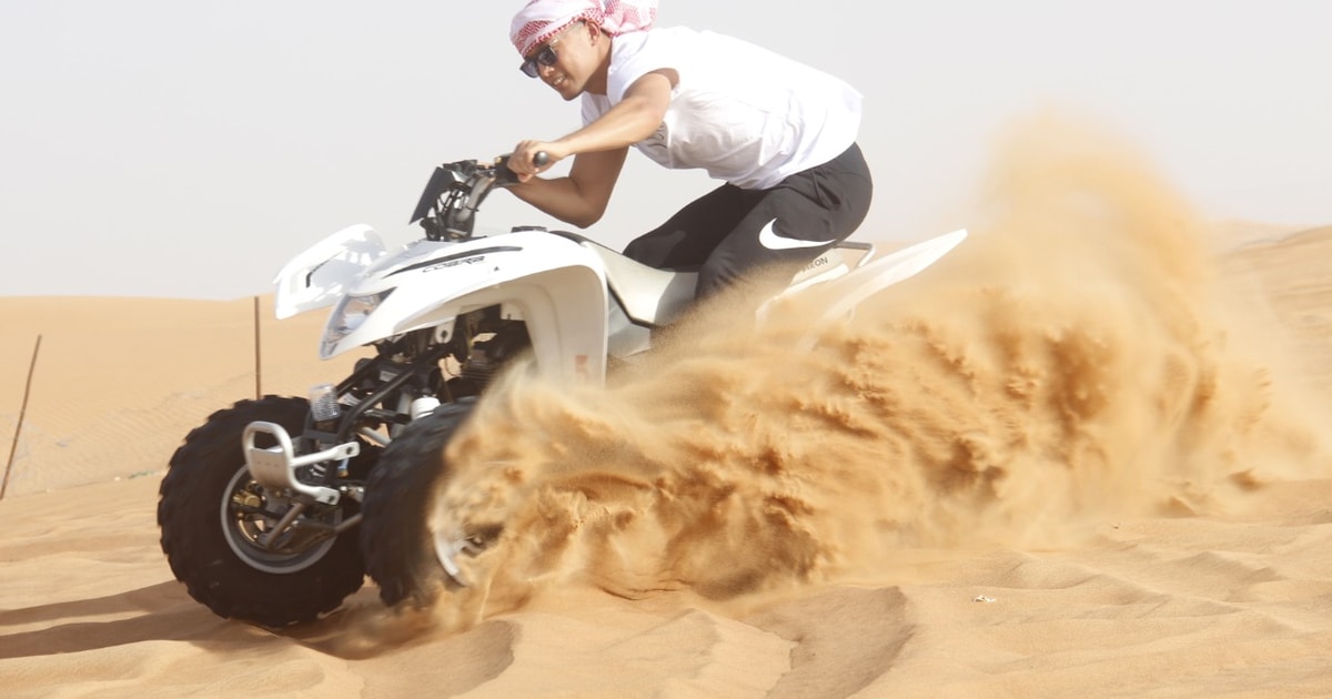 Morning Quad Bike Desert Adventure Dune Bashing Sand Board | GetYourGuide