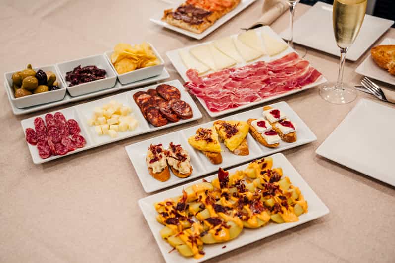 Sagrada Familia, Jamon & Tapas Tasting Experience | GetYourGuide