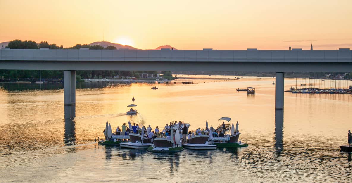 Vienna: E-Boat Rental with included Sunset dinner on Danube | GetYourGuide
