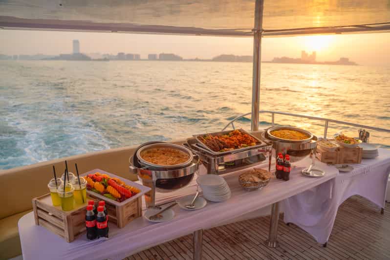 Dubai: Sunset Yacht Cruise with BBQ Dinner & Photography | GetYourGuide