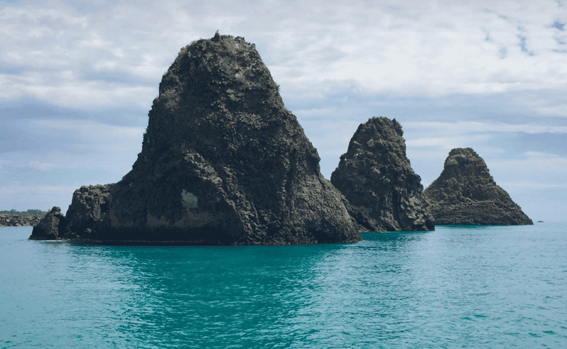 Catania: Cyclops Coast Cruise with Appetizer & Snorkeling | GetYourGuide